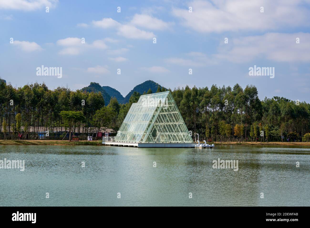 Glass house triangle church by the lake Stock Photo - Alamy