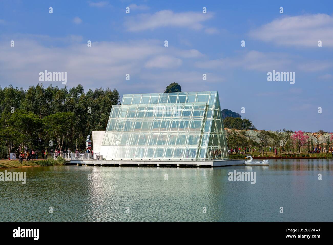 Glass house triangle church by the lake Stock Photo - Alamy