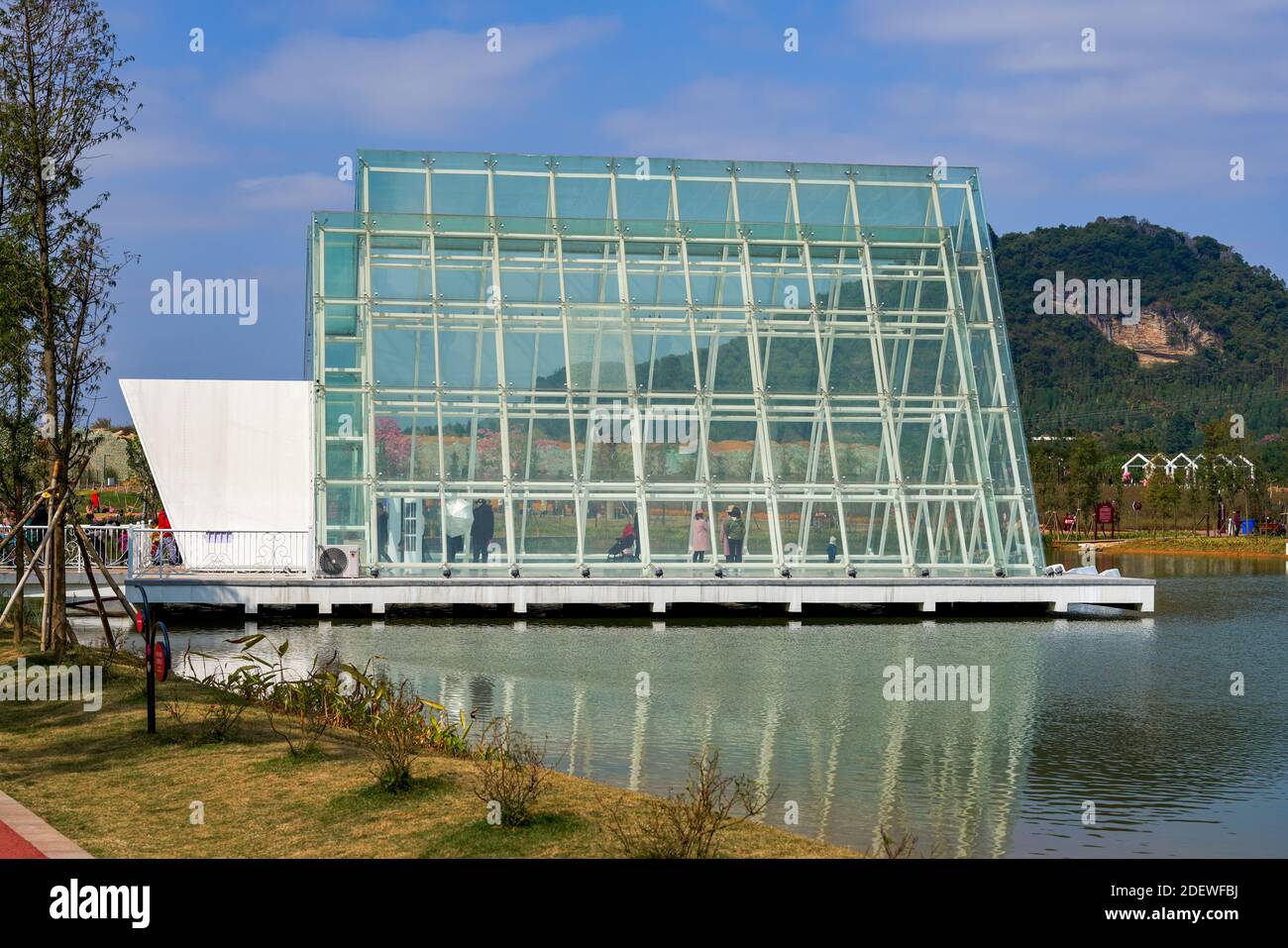 Glass house triangle church by the lake Stock Photo - Alamy