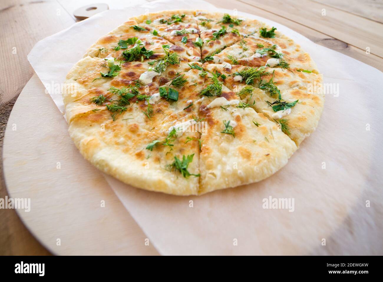 Close up pile of Caucasian khychin bread pie with stuffing Stock Photo ...