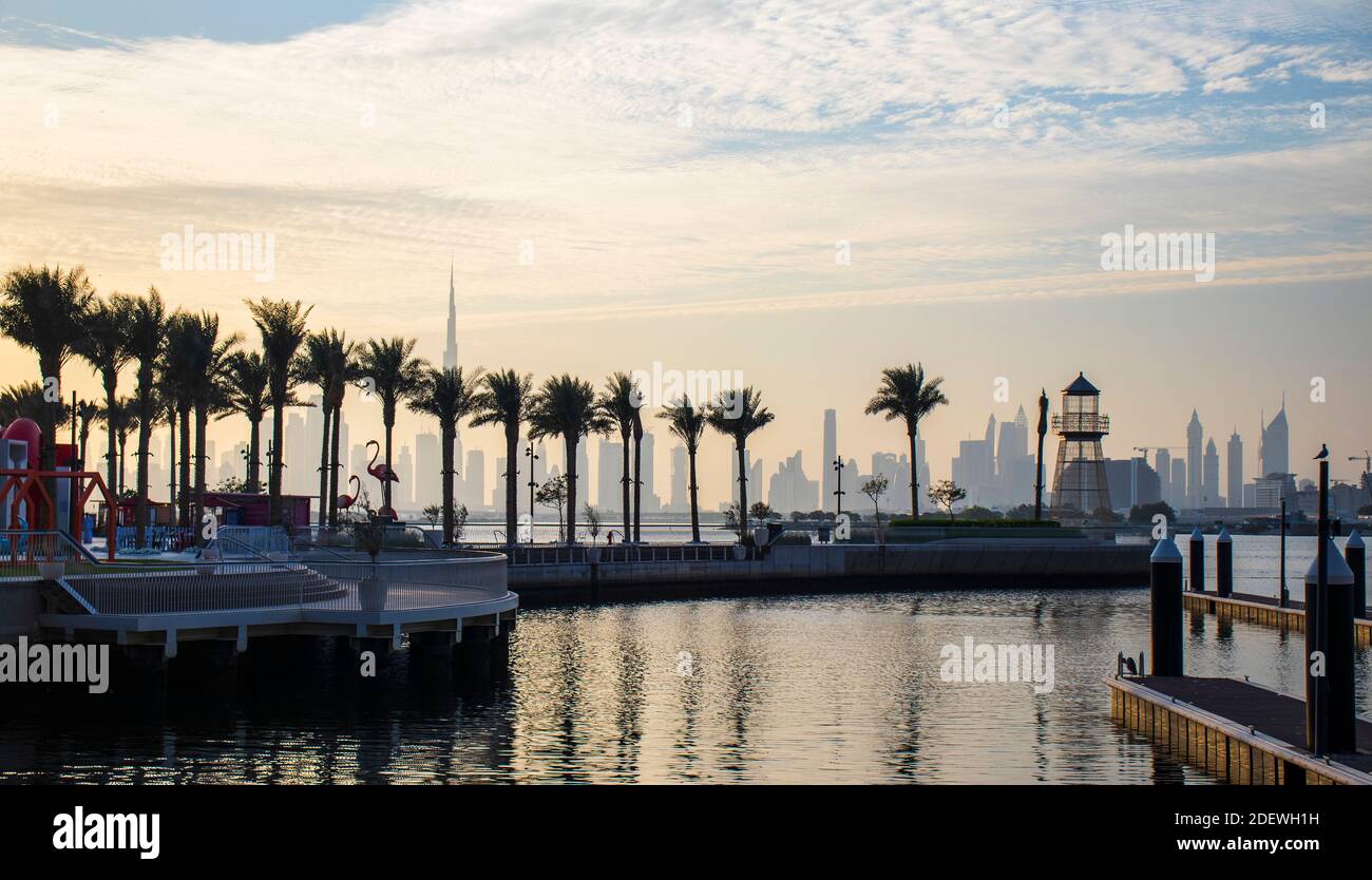 View of a Dubai city skyline from the wharf on Dubai creek harbour. UAE ...