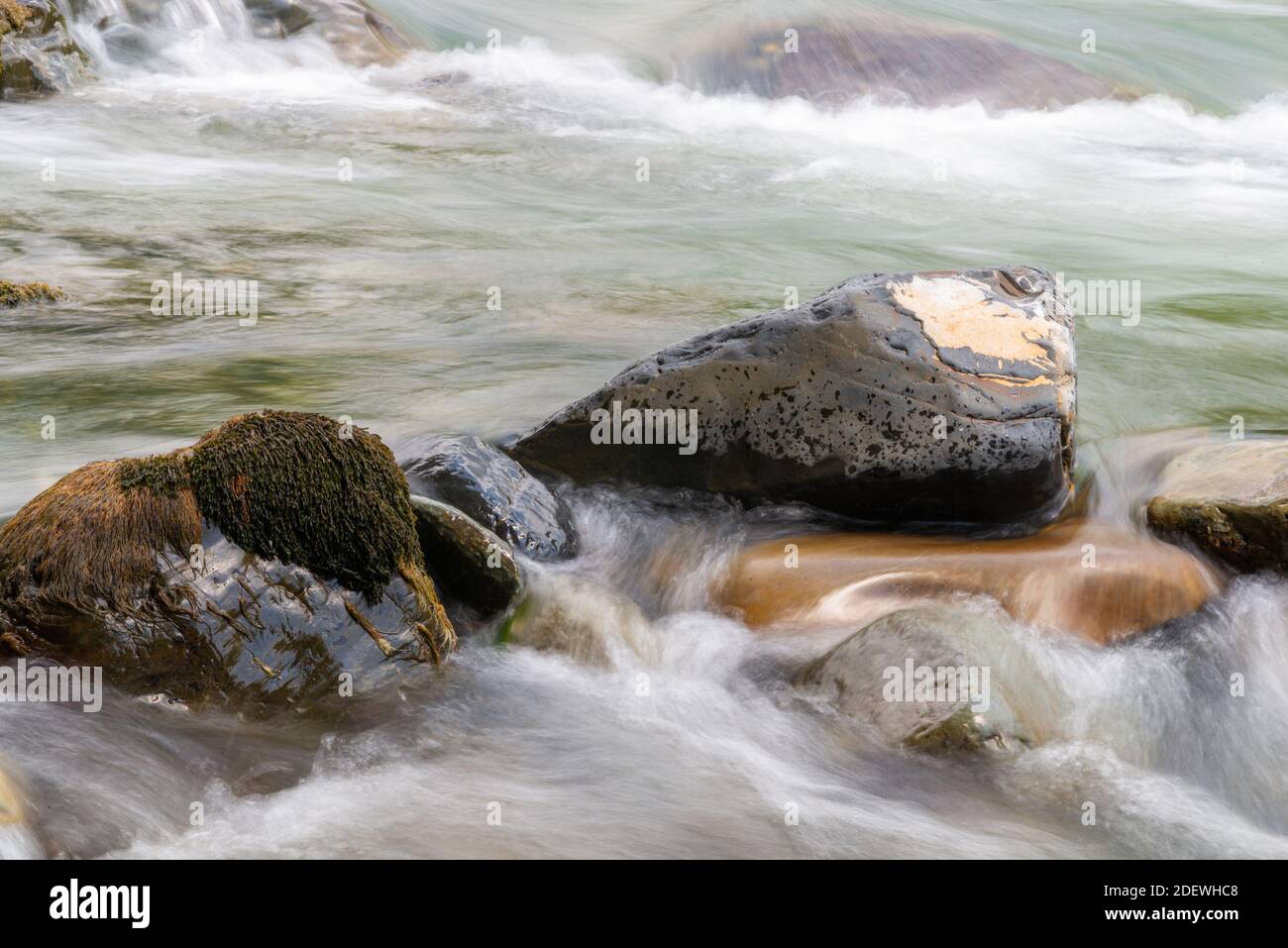 Mountain water stream running in hi-res stock photography and images ...