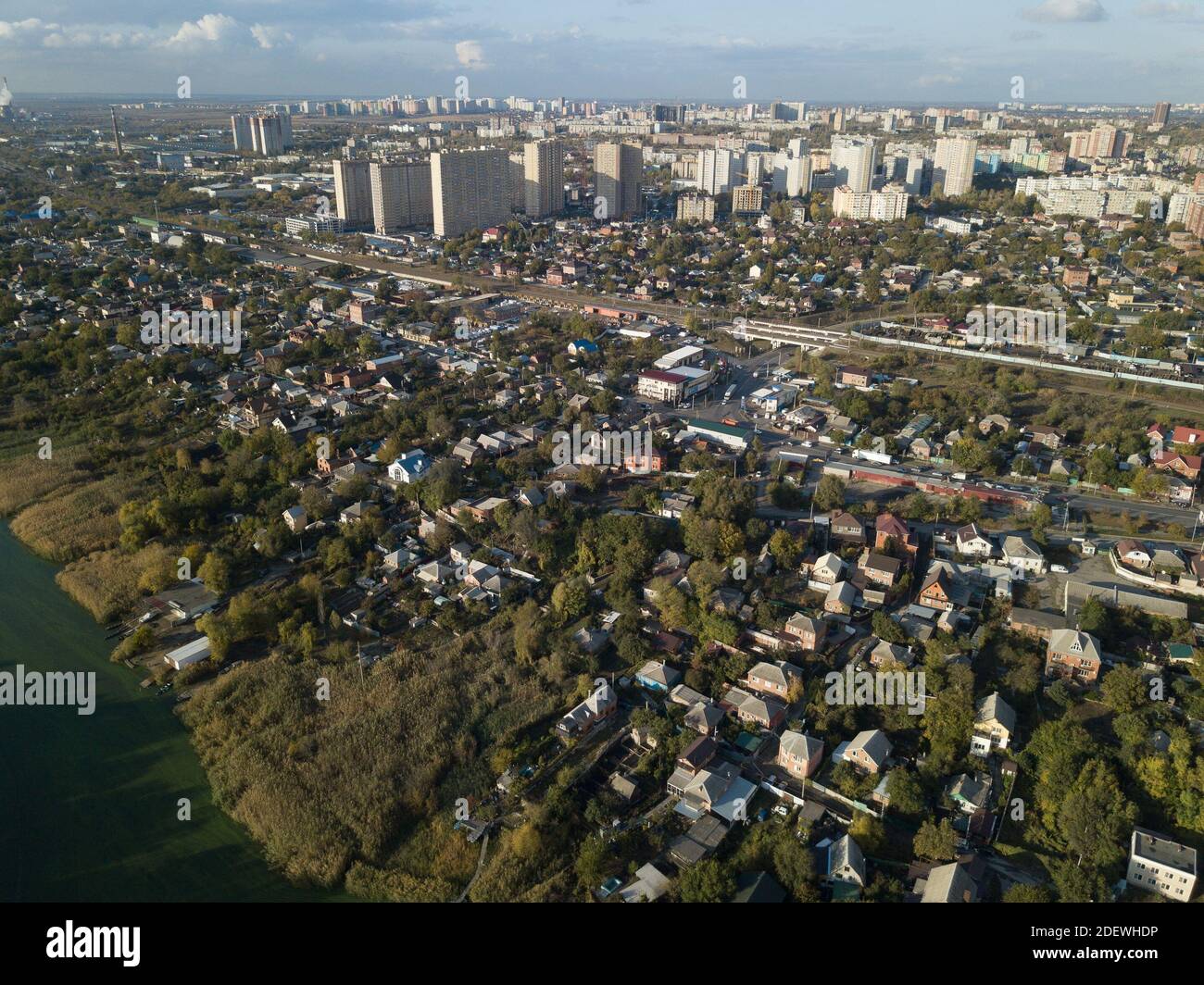 Aerial view of city. Big and small houses in town Stock Photo - Alamy