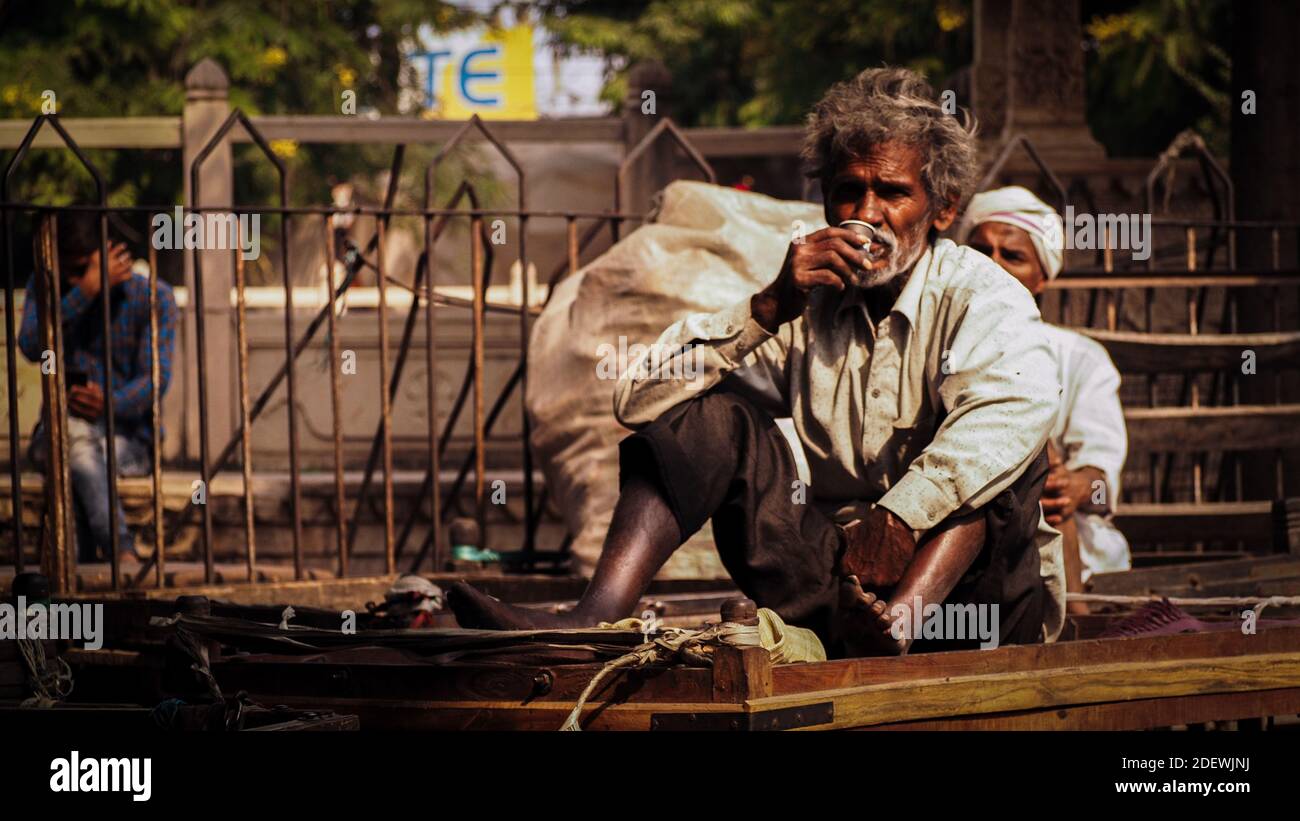 A man is sitting and having a chai (Indian tea) in Bundi, India Stock ...