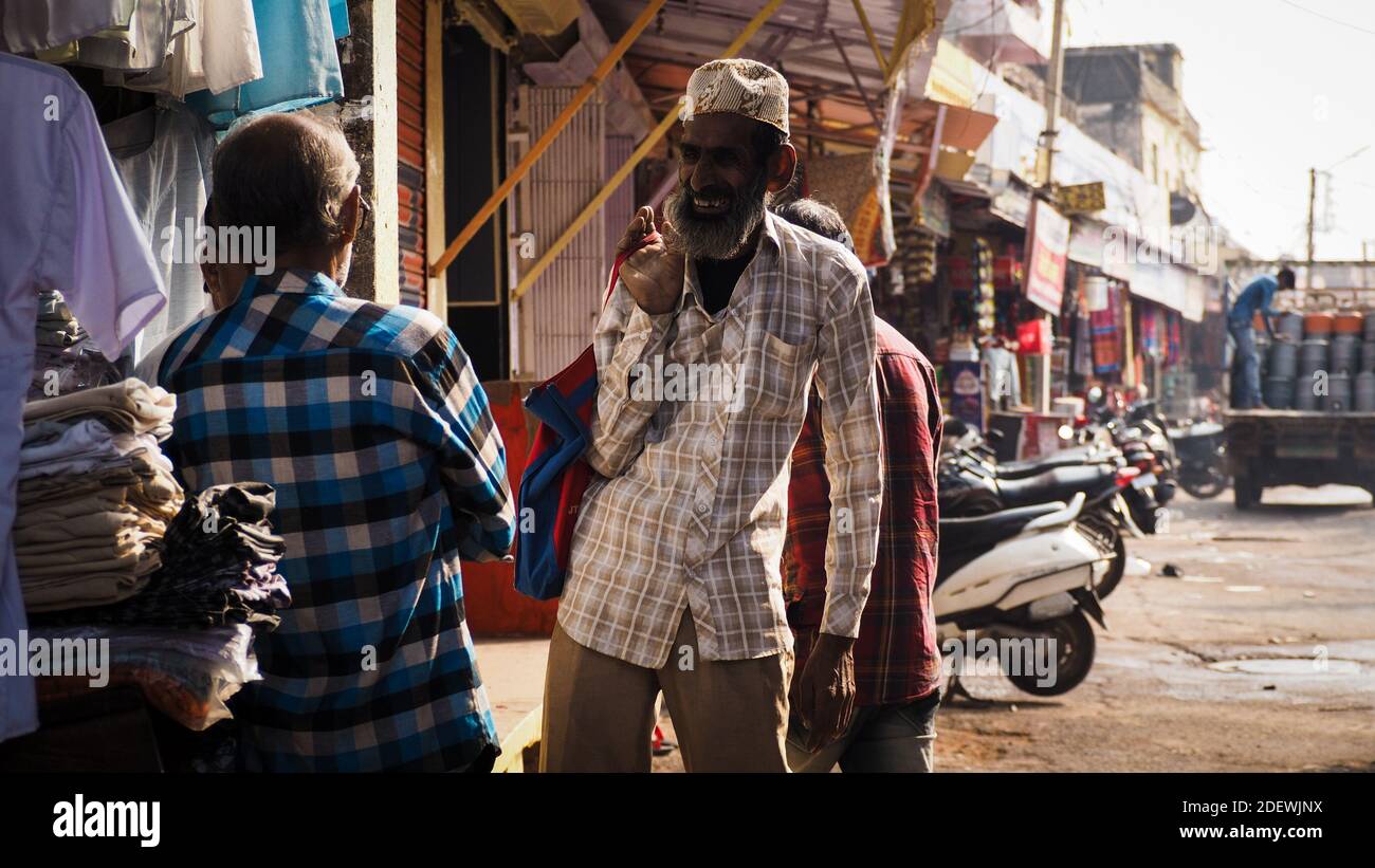 Men are having a conversation on a street in Bundi, India Stock Photo ...