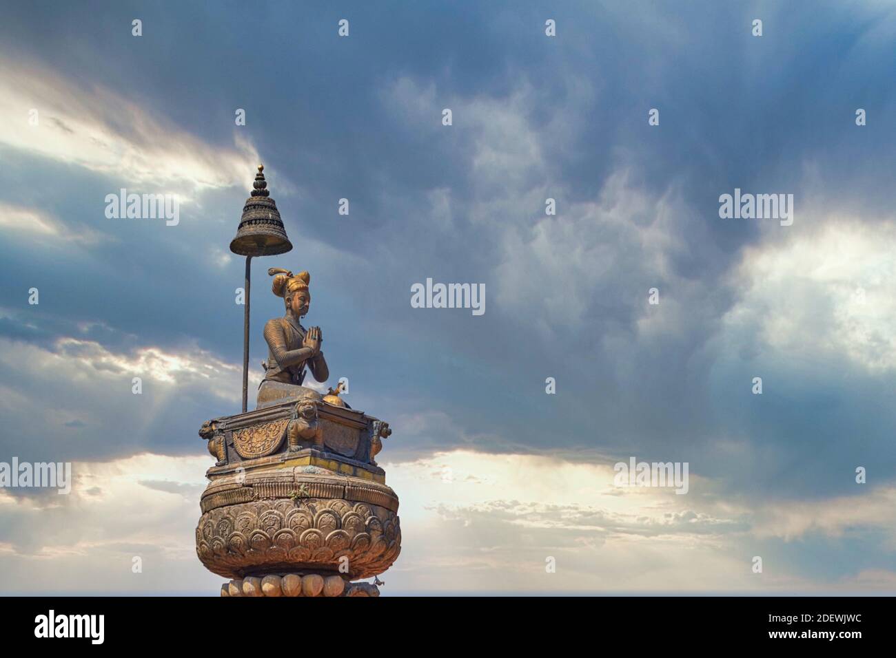 Statue of a praying King Bhupatindra Malla in front of the Royal Palace ...