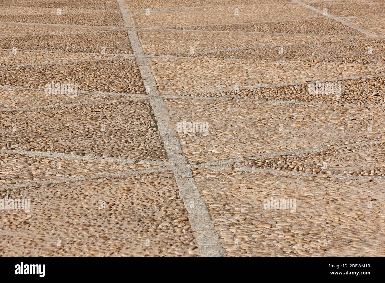 Textured stone pebble pattern ground. Textured mosaic decorative street ...