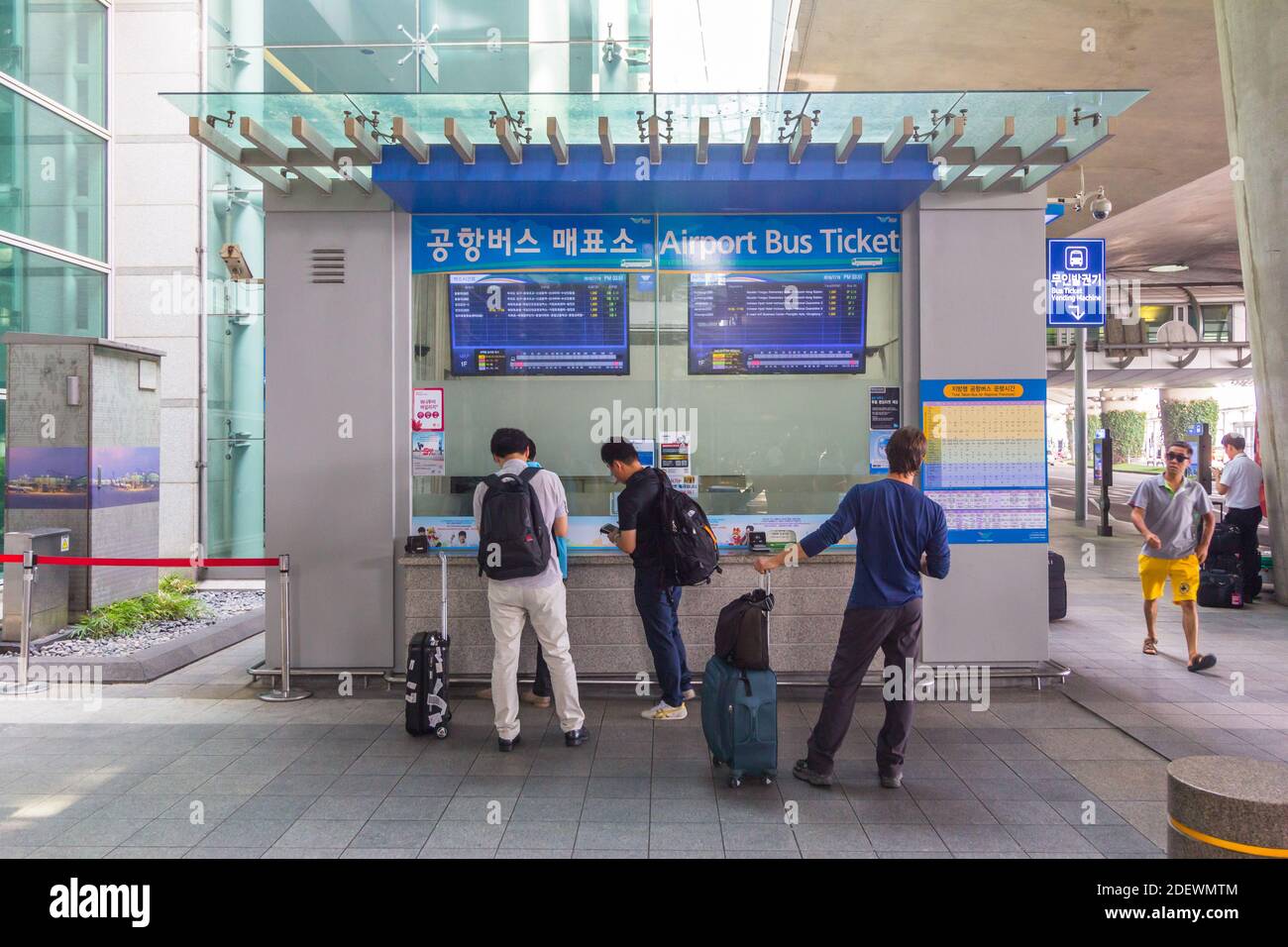 Passengers taking the bus to Seoul outside of Incheon International ...