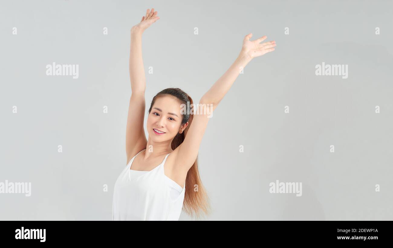 portrait of woman with hands up, isolated on white Stock Photo - Alamy