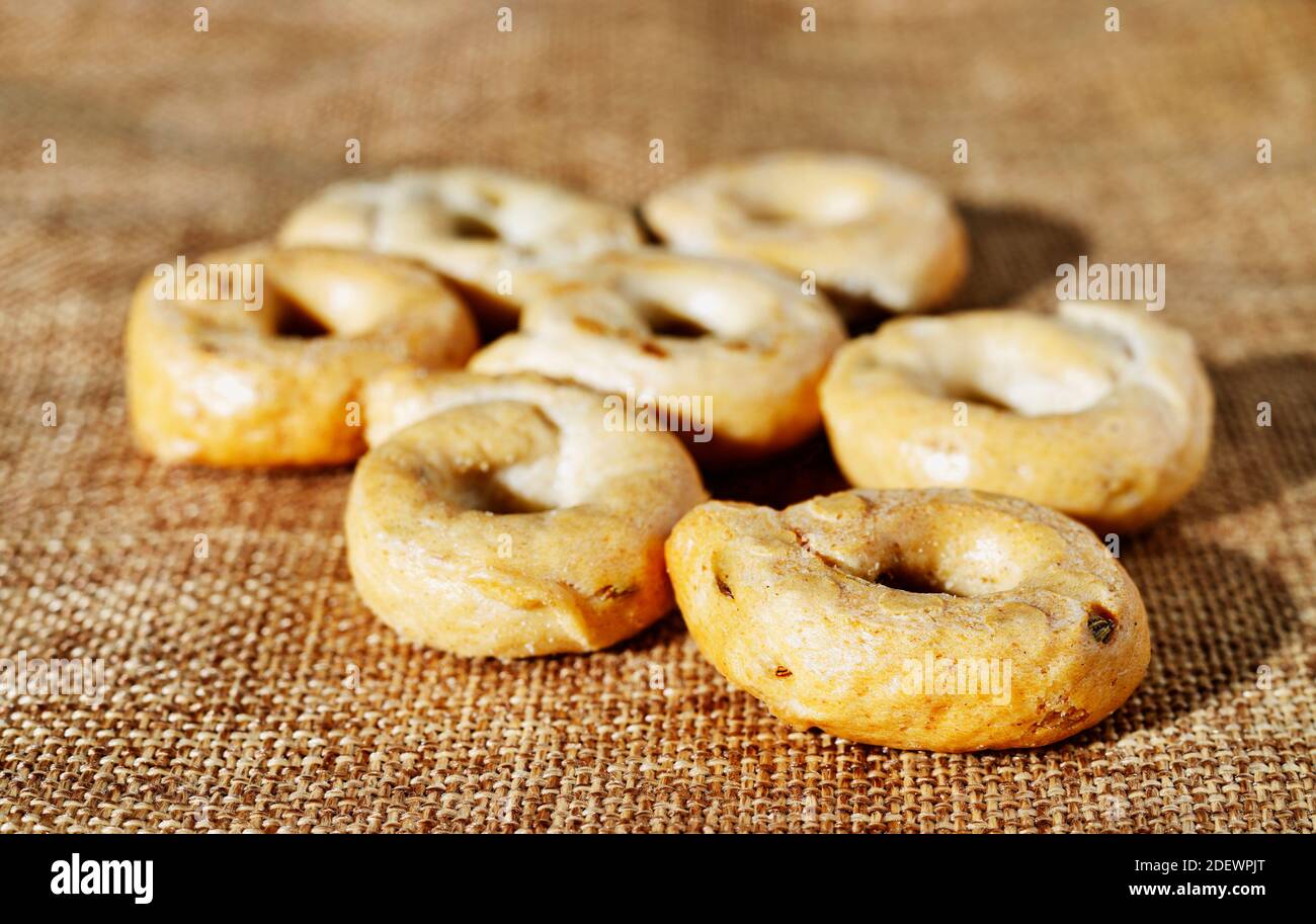Taralli snack food on colored background Stock Photo - Alamy