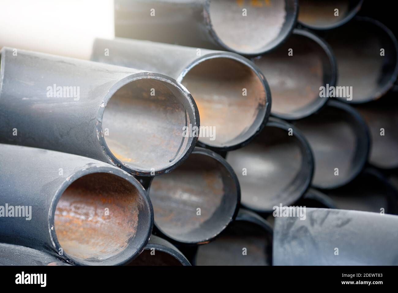 Black metal pipes and adapters of different diameters for gasification ...
