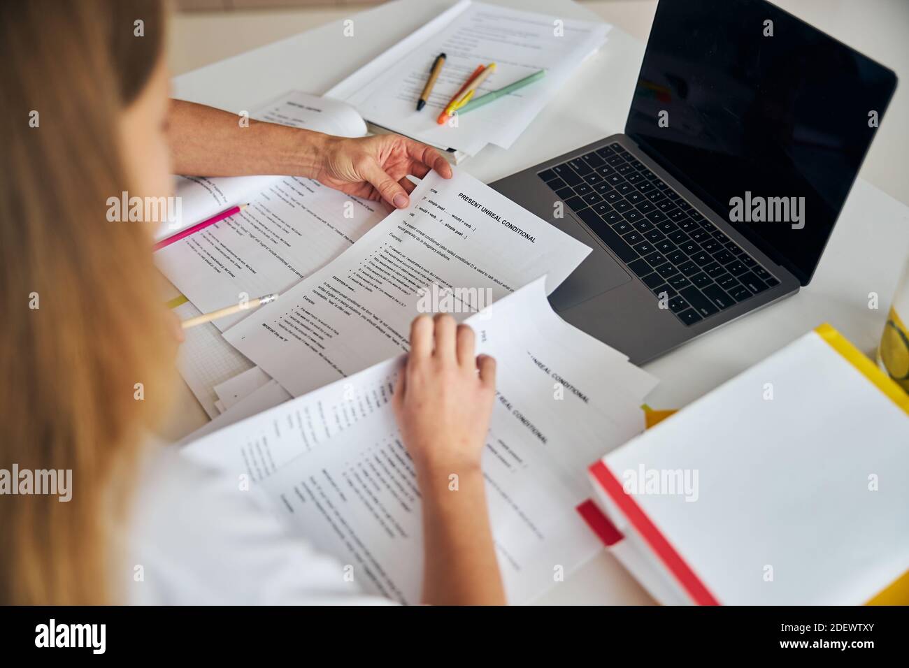 People going through the files on the table Stock Photo - Alamy