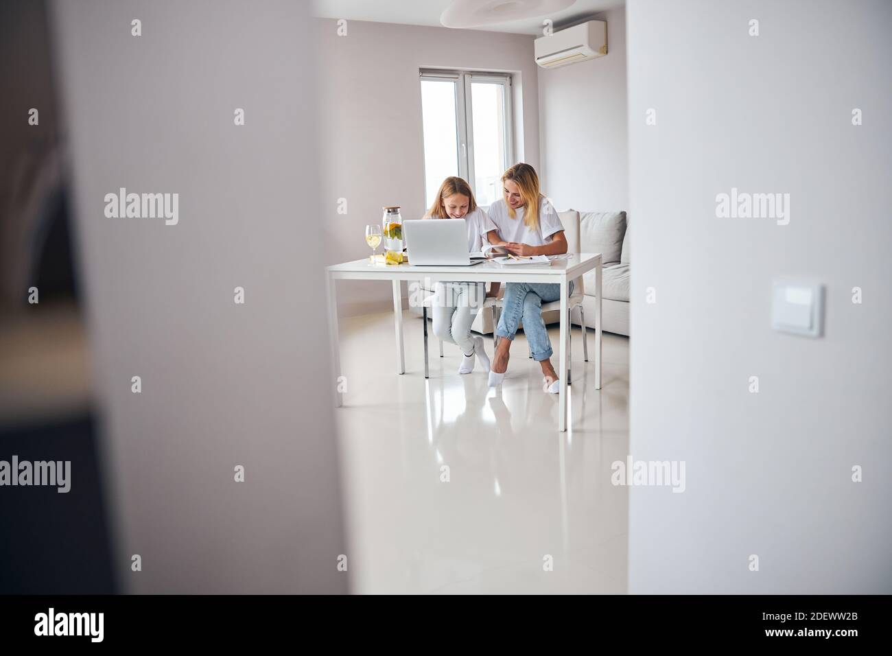 Lively family members turning over the book pages Stock Photo - Alamy