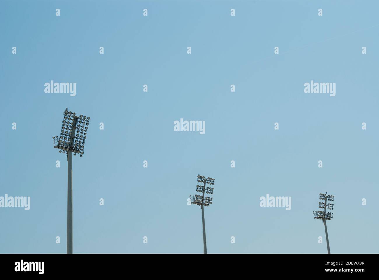 A Stadium light pole in the sky Stock Photo - Alamy