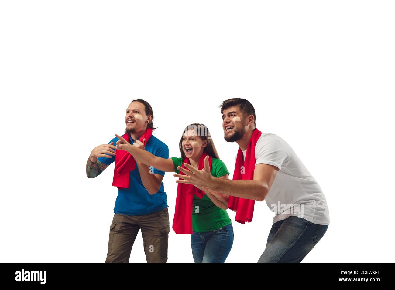 Hopeful. Three soccer fans woman and men cheering for favourite sport ...