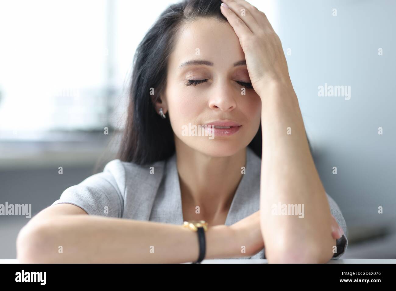 Portrait of tired woman with closed eyes Stock Photo - Alamy