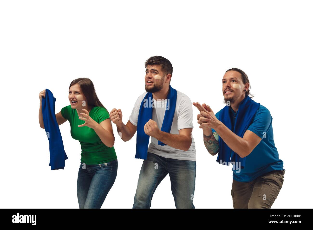 Teamwork and win. Female and male soccer fans cheering for favourite ...