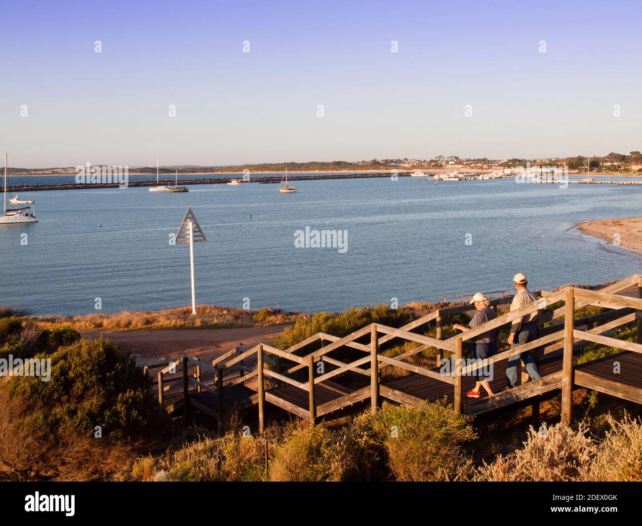 Tourists descending from Fishermens Memorial Lookout overlooking Port ...