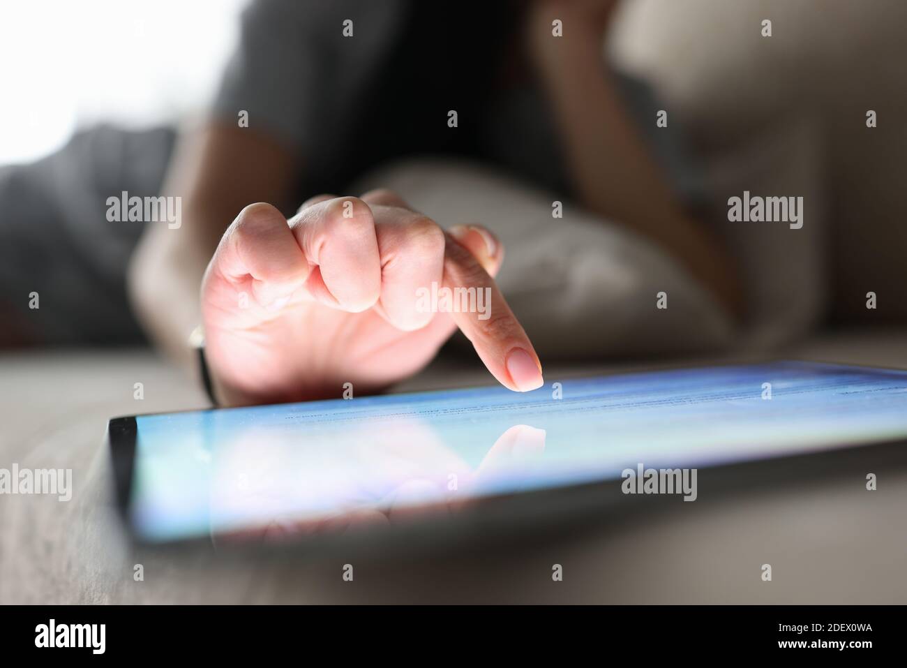 Female finger over the included tablet closeup Stock Photo - Alamy