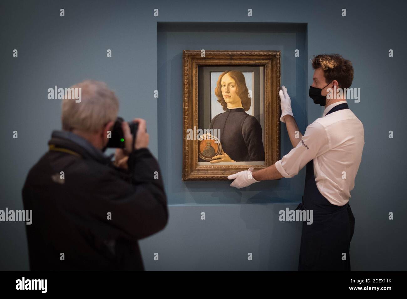 A Sotheby's gallery assistant adjusts one of Renaissance master Sandro ...