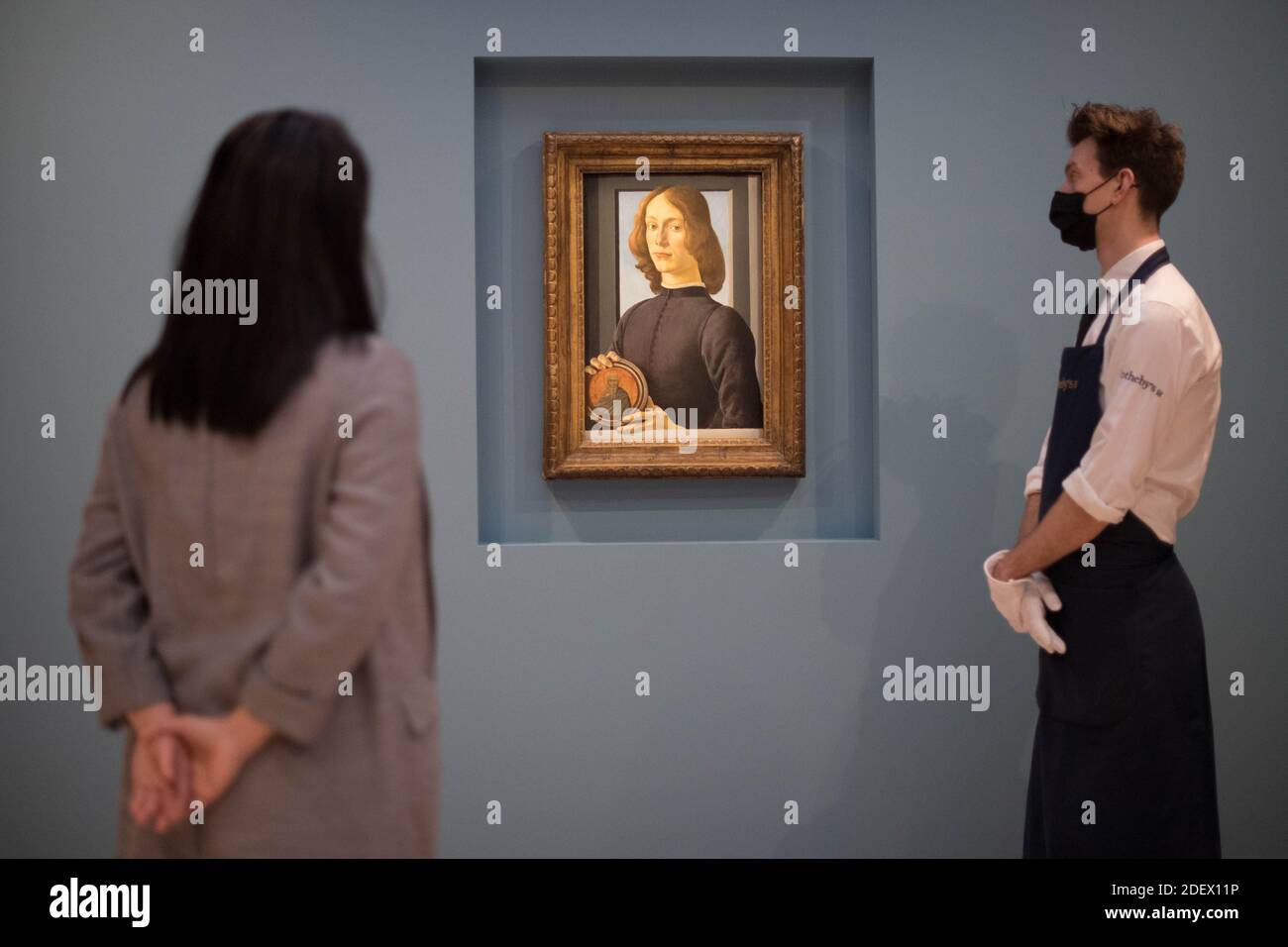 A Sotheby's gallery assistant looks at one of Renaissance master Sandro ...