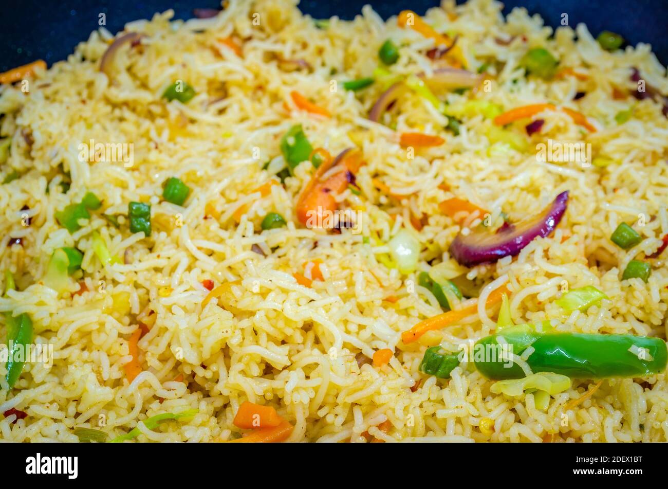 Closeup of colorful Idiyappam Noodles or Indian Rice Noodles in a pan ...