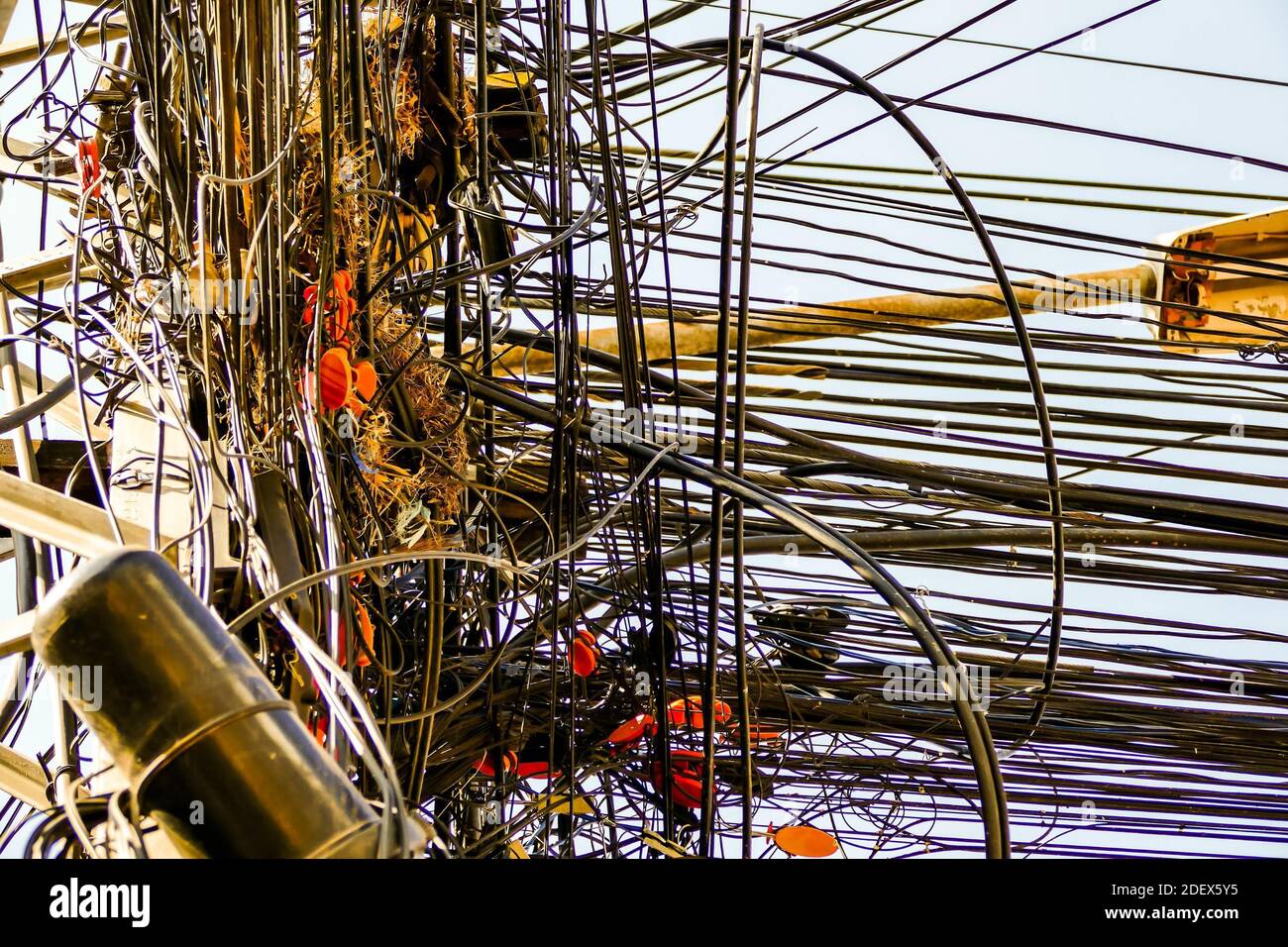 A closeup shot of messy electrical wires and cables in South East Asia ...
