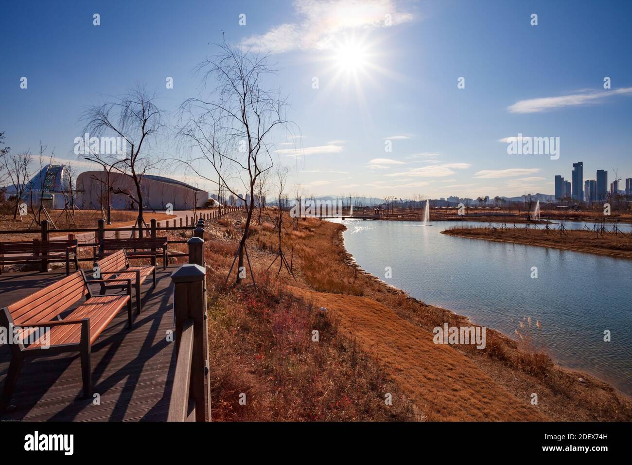 Landscape of Korean traditional buildings, trees, mountains, stones ...