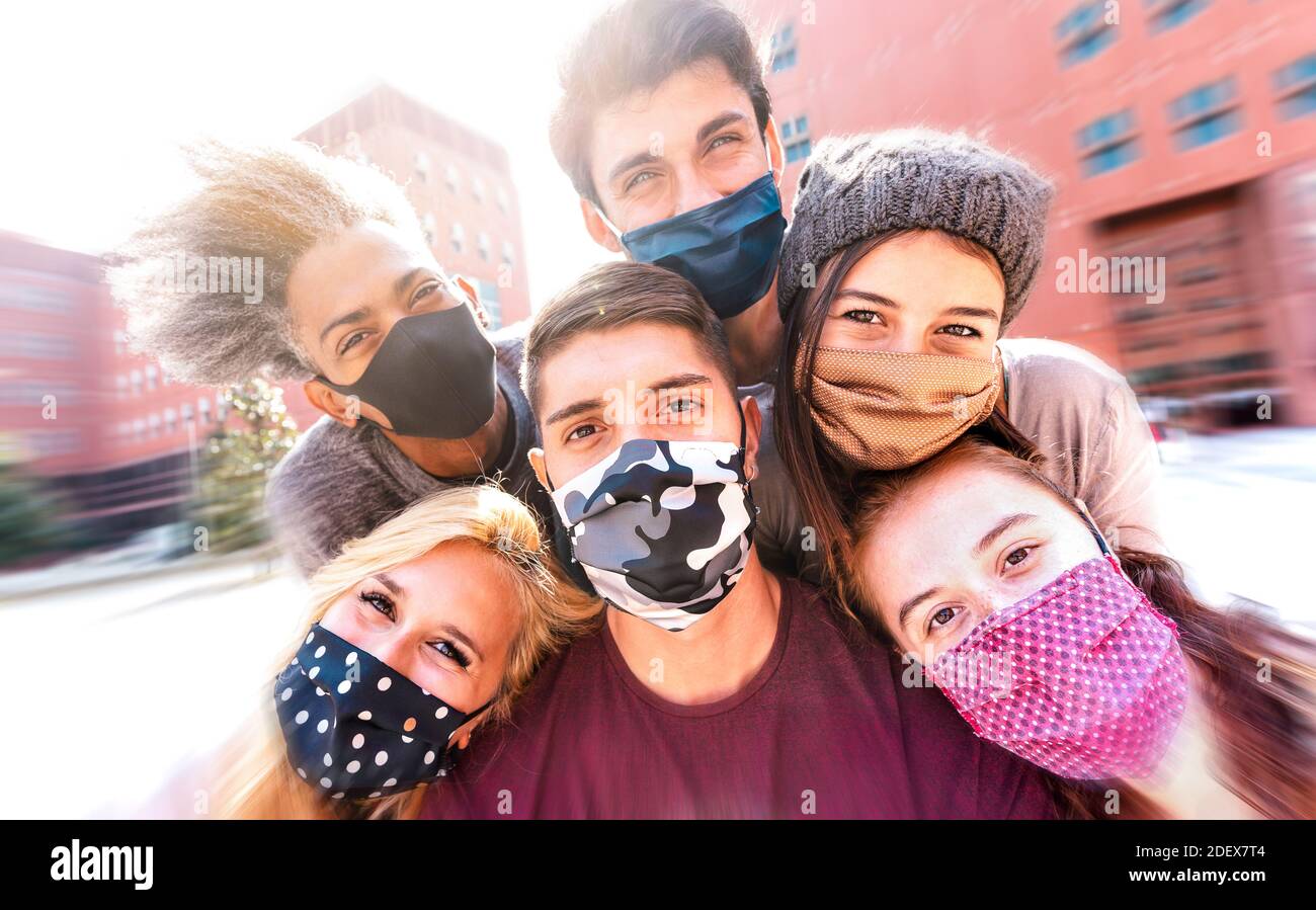 Diverse group of teens wearing masks hi-res stock photography and ...