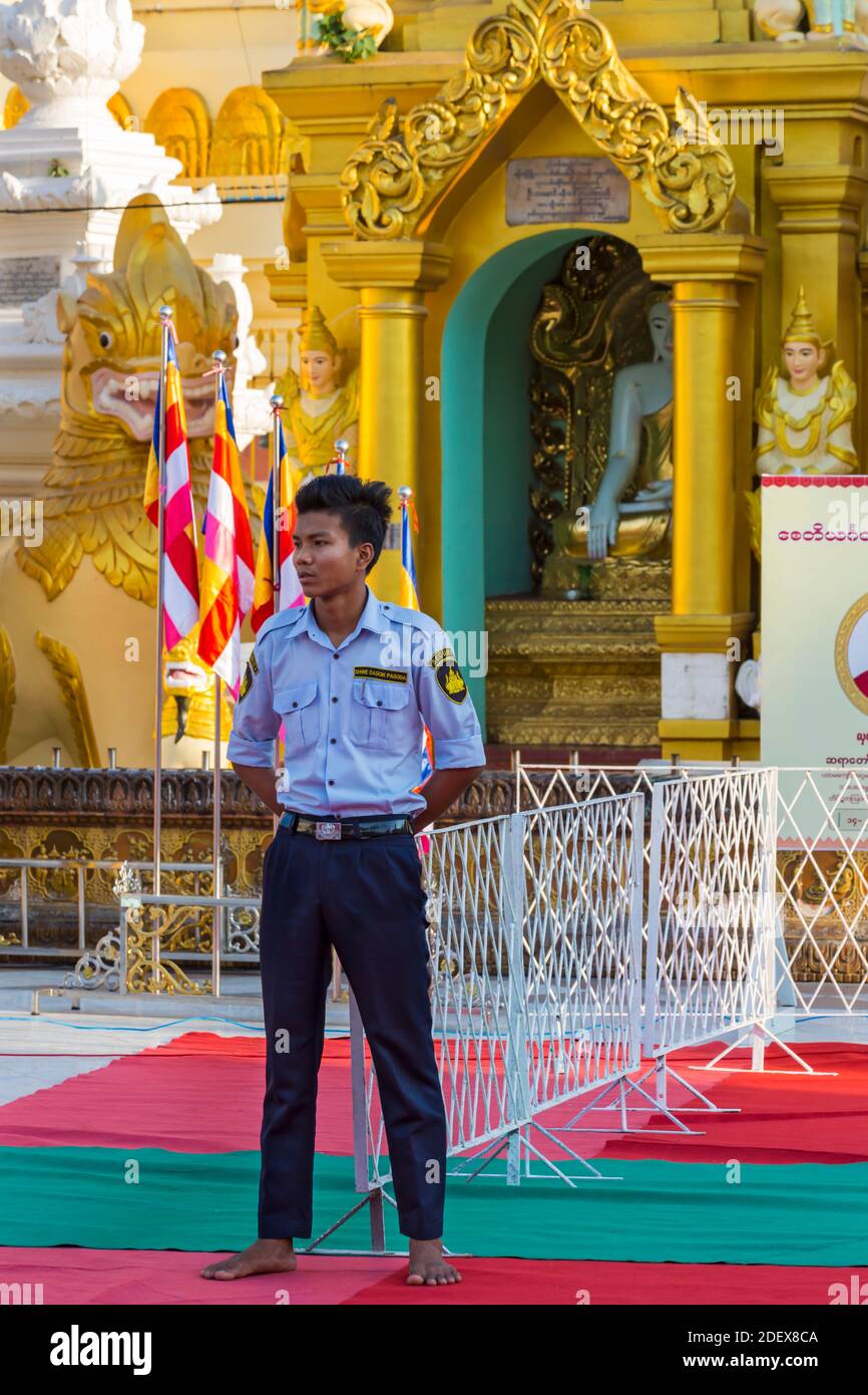 Security guard at Shwedagon Pagoda, Yangon, Myanmar (Burma), Asia in ...