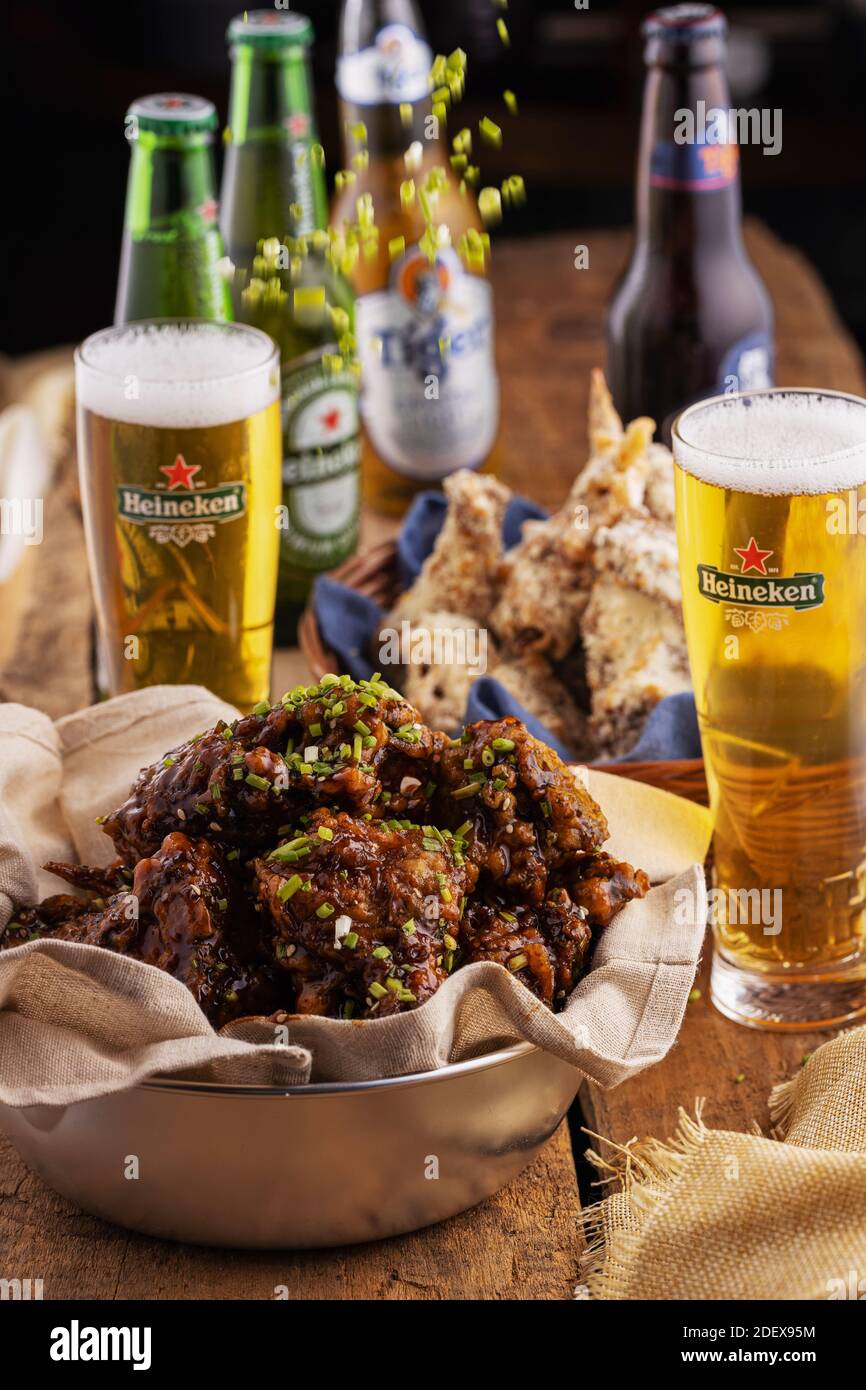 METRO MANILA, PHILIPPINES - Nov 08, 2017: Eating and drinking chicken ...