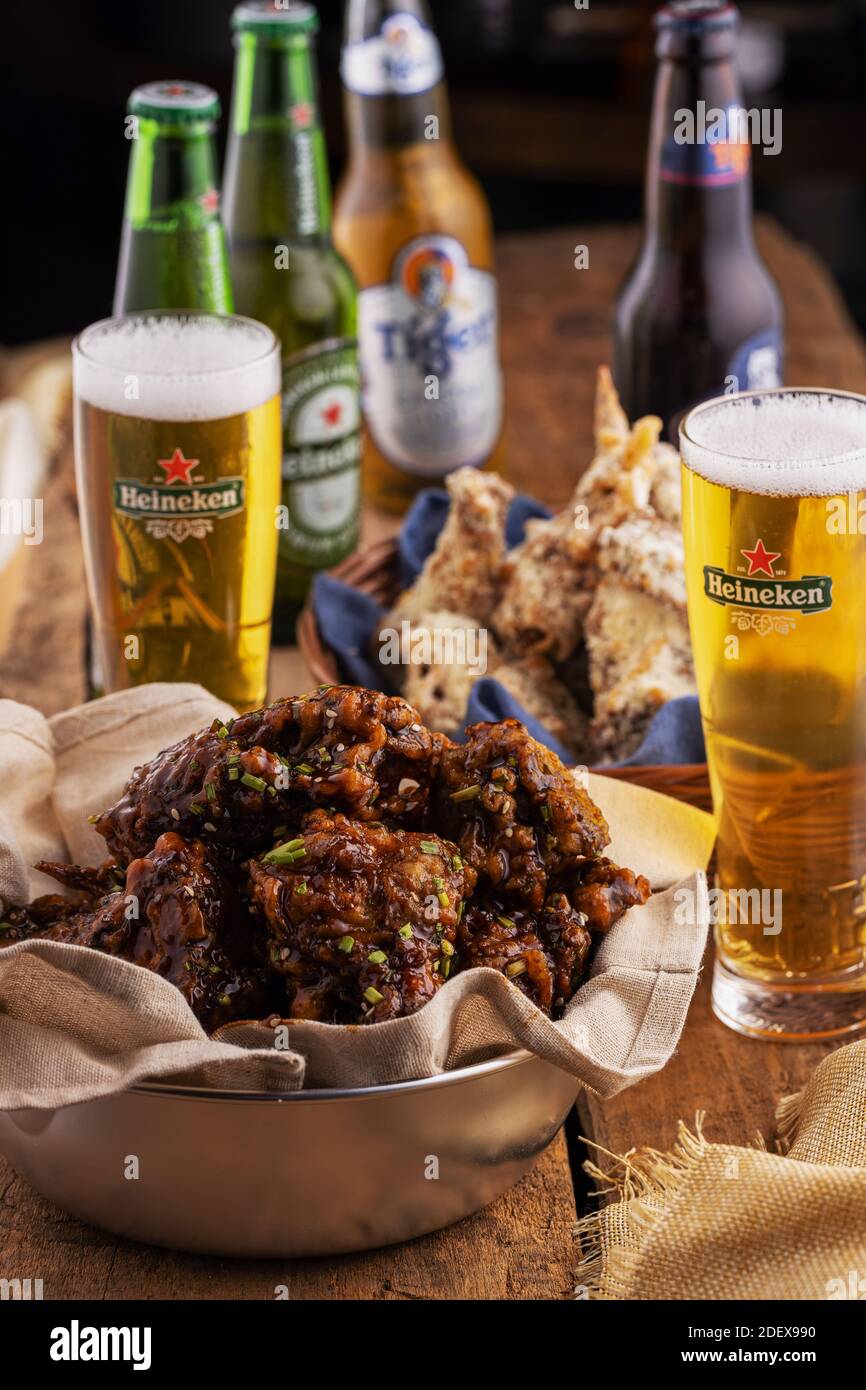 METRO MANILA, PHILIPPINES - Nov 08, 2017: Eating and drinking chicken ...