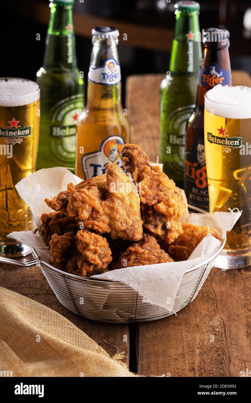 METRO MANILA, PHILIPPINES - Nov 08, 2017: Eating and drinking chicken ...