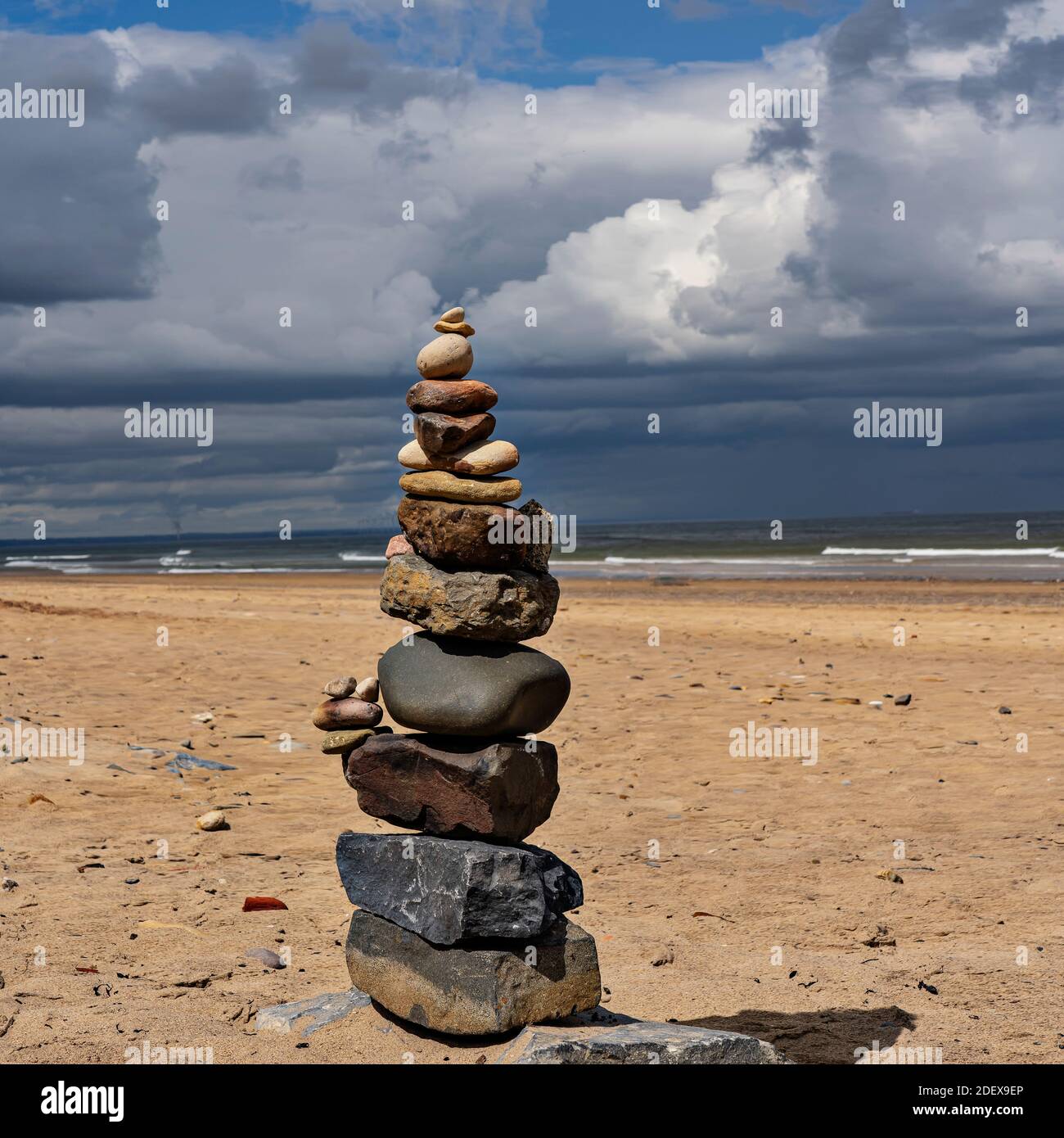 stone structure made of stacked pebbles on beach at marske-by-the-sea ...