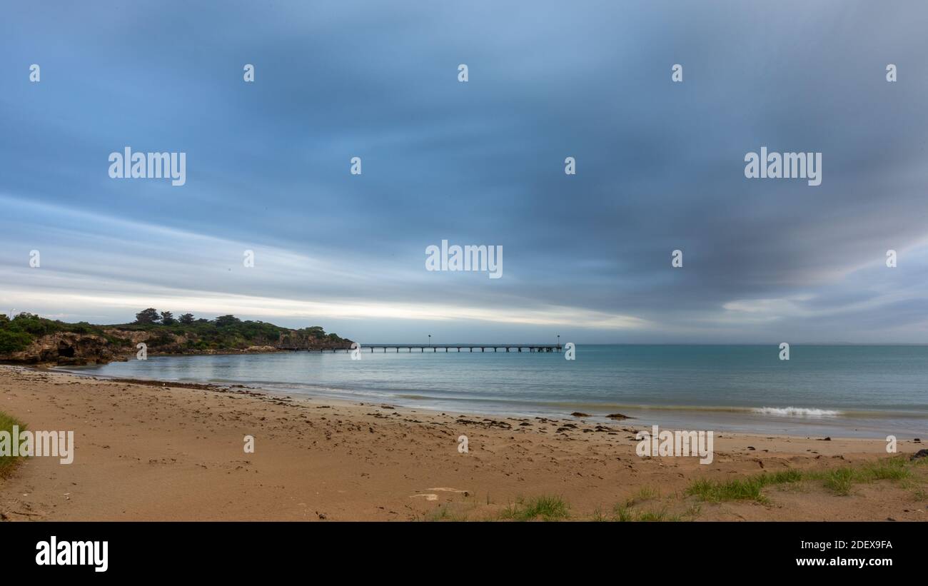 Wild weather and storm clouds above the Robe jetty located in South ...