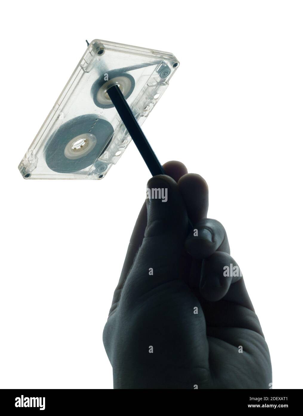 Rewind tape on cassette isolated on white background Stock Photo - Alamy