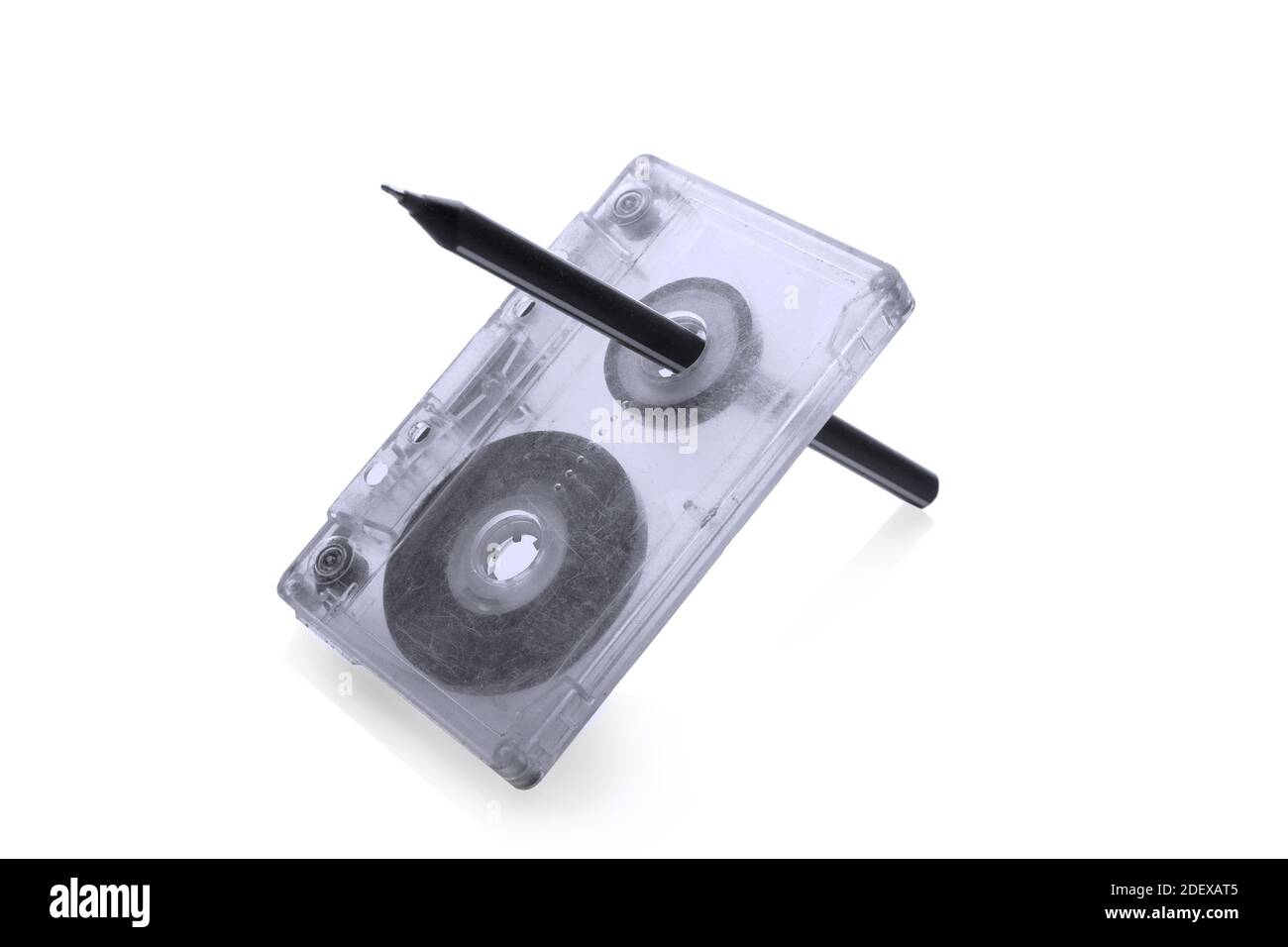 Rewind tape on cassette isolated on white background Stock Photo - Alamy