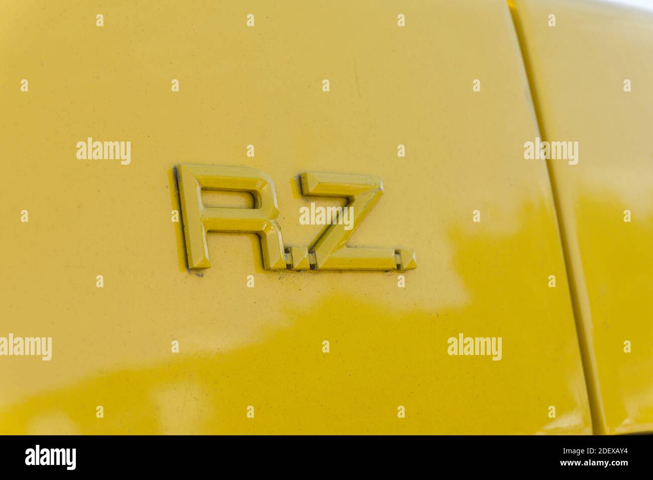 Model name badge on the back of a yellow Alfa Romeo RZ convertible ...