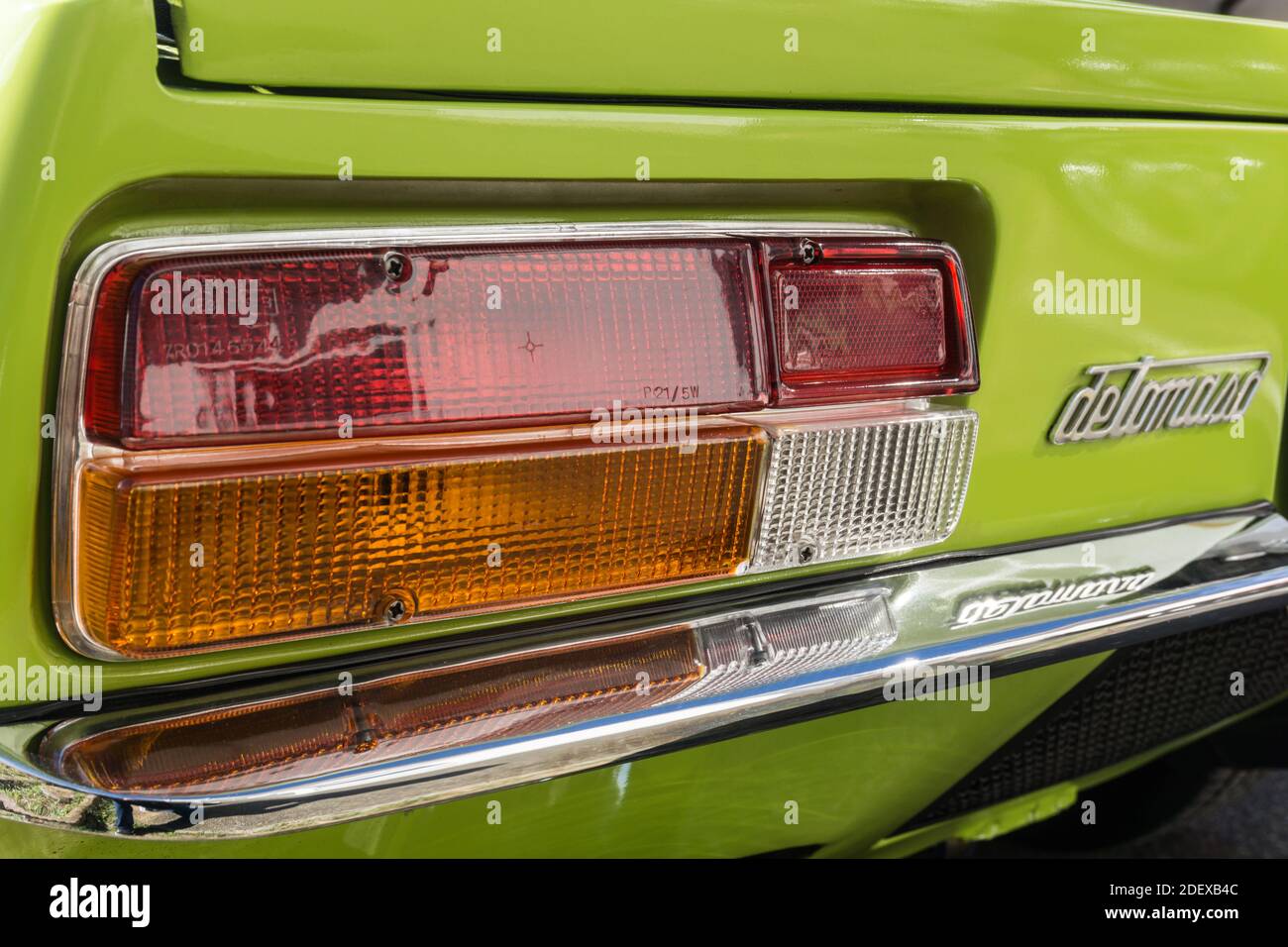 Close up of the rear light cluster and chrome bumper on a lime green De ...