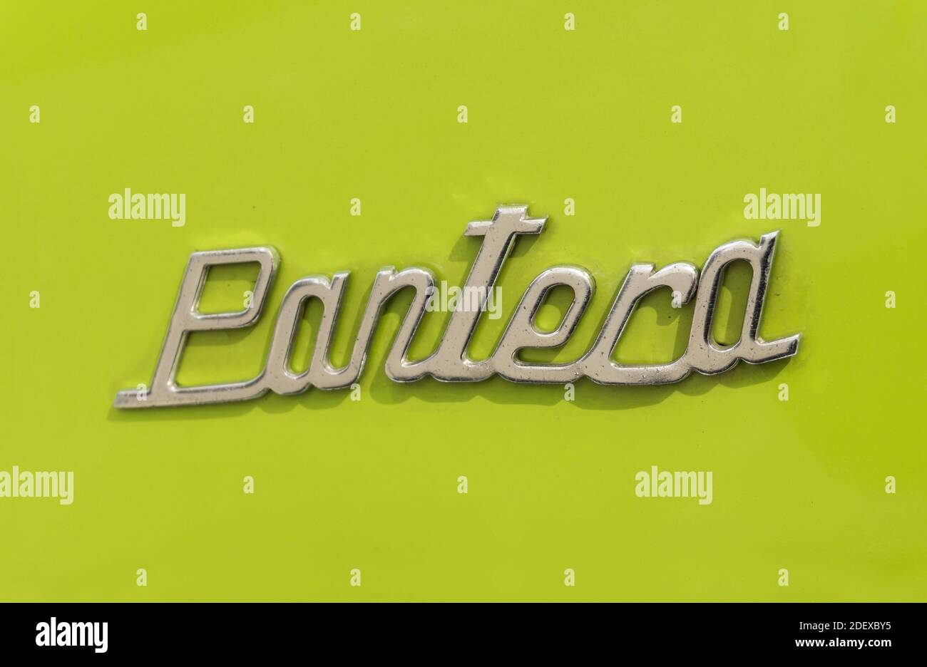 De Tomaso brand logo badge on the rear of a lime green De Tomaso ...