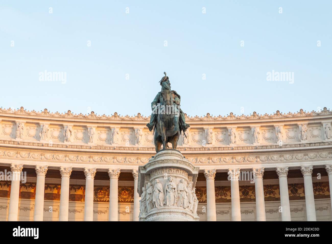 Statue of Victor Emmanuel Vittoriano in front of classical colonnade ...