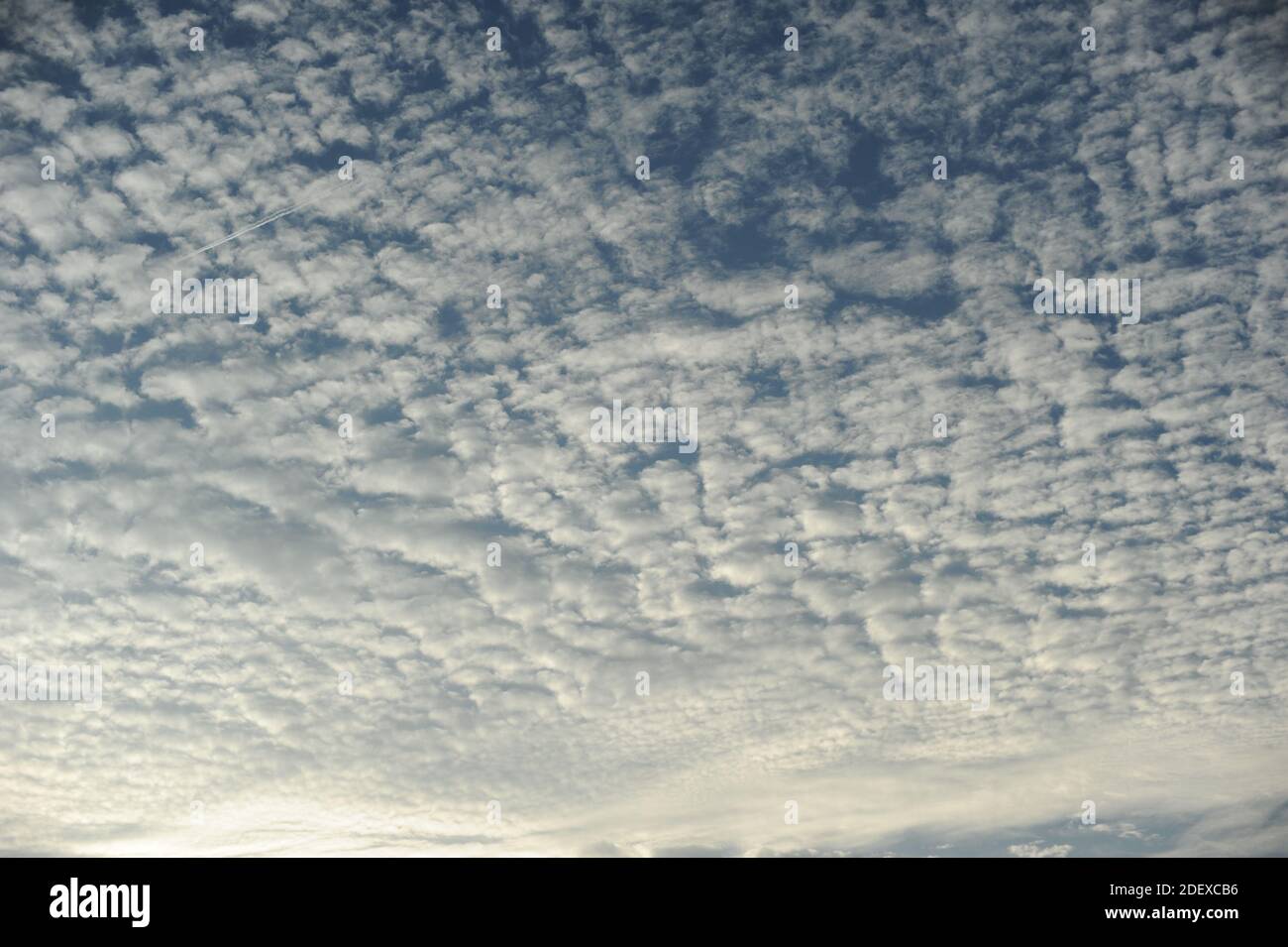 Blue sky filled with beautiful clouds Stock Photo - Alamy