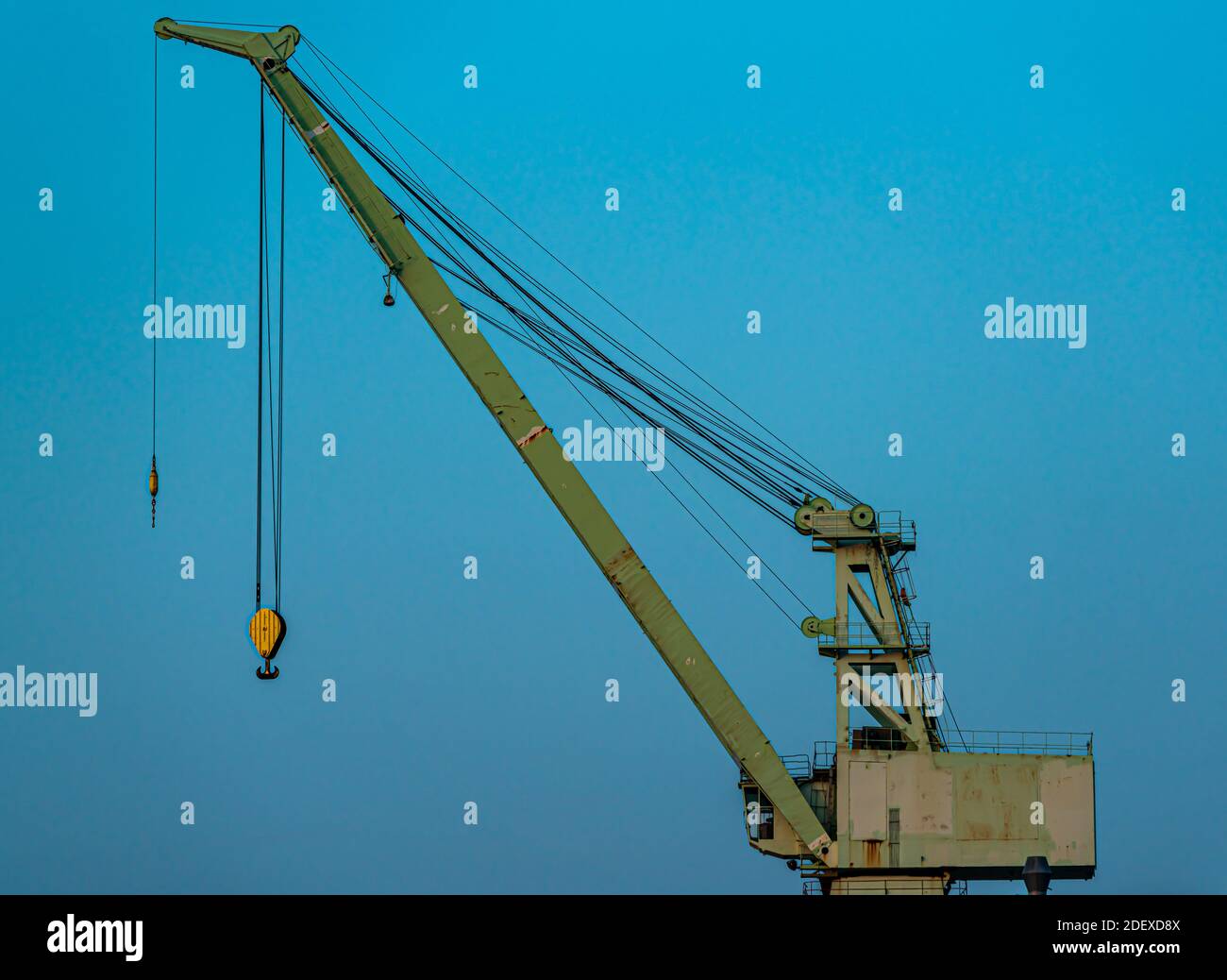 Large and old industrial heavy lift crane at a shipyard Stock Photo - Alamy