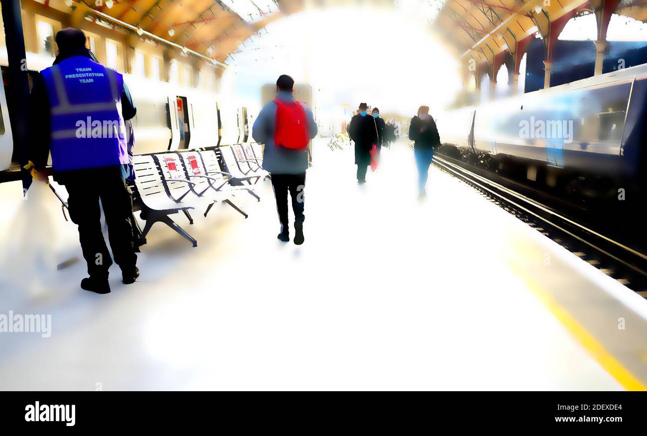 London, England, UK. Digitally enhanced image of rail passengers in ...