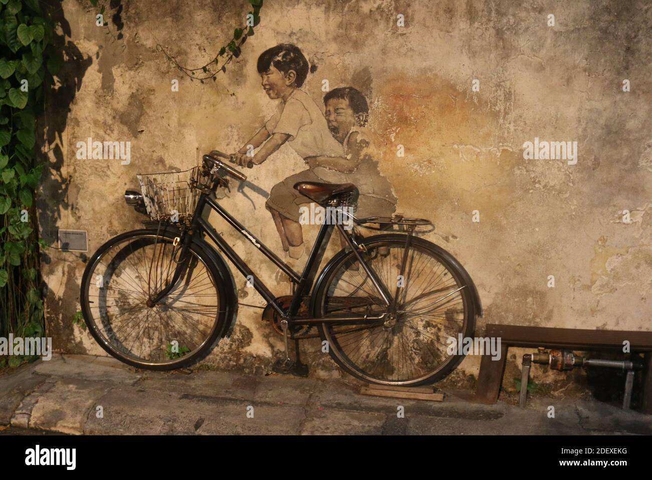 GEORGETOWN, MALAYSIA - Nov 28, 2020: Street art ´Little Children on Bicycle´ by Luthuanian ...