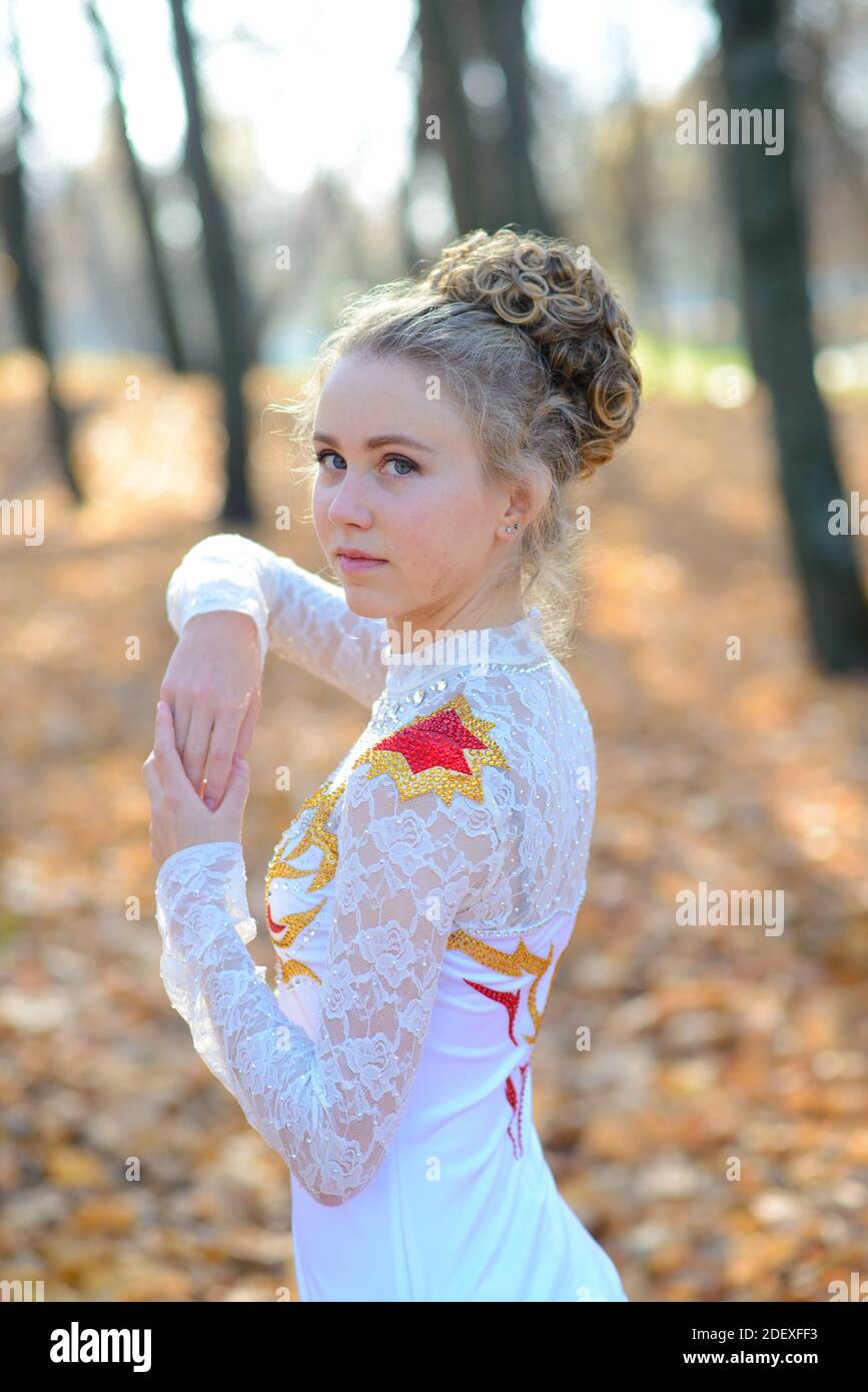 Ballerina dancing in nature park among autumn leaves Stock Photo - Alamy
