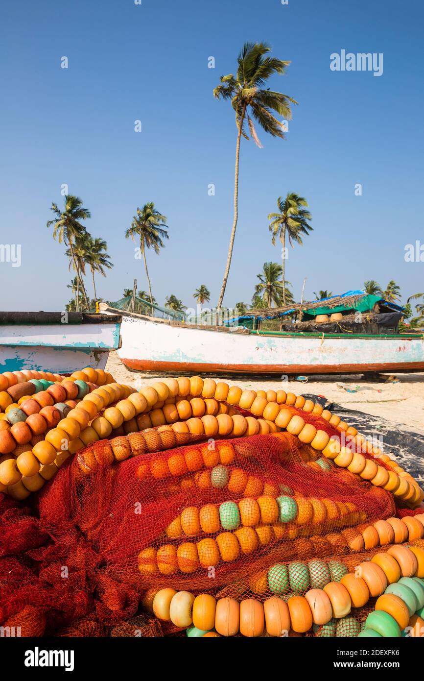 India, Goa, Fishing boats and nets on Colva beach Stock Photo - Alamy