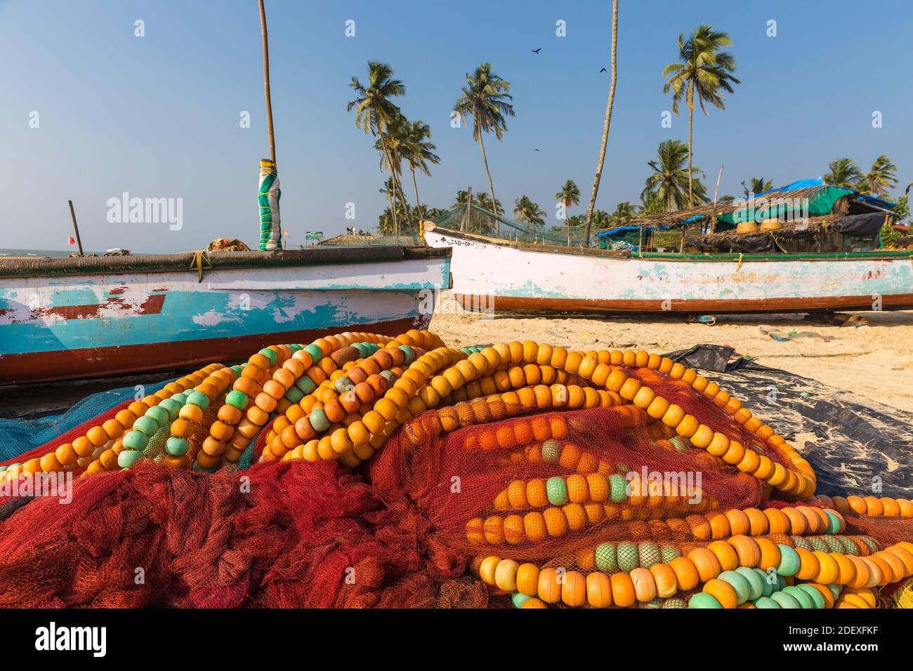India, Goa, Fishing boats and nets on Colva beach Stock Photo - Alamy