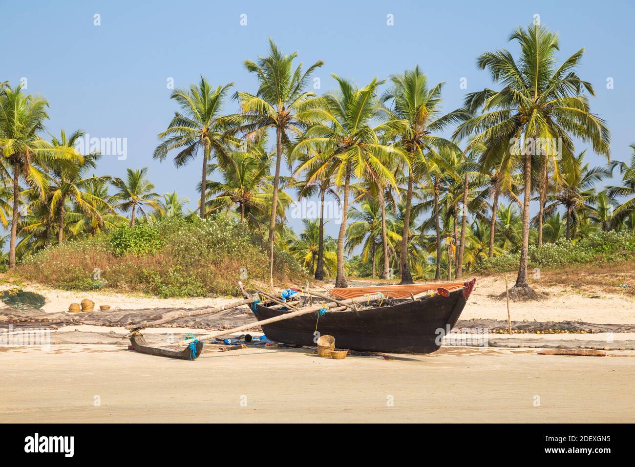 India, Goa, Fishing boat and nets on Colva beach Stock Photo - Alamy