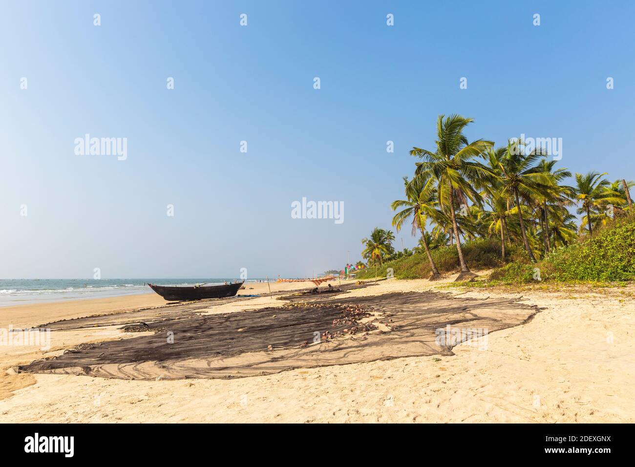 India, Goa, Fishing boat and nets on Colva beach Stock Photo - Alamy